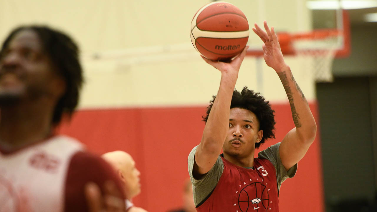 Hogs' Nick Smith, Anthony Black, Trevon Brazile after practice ...