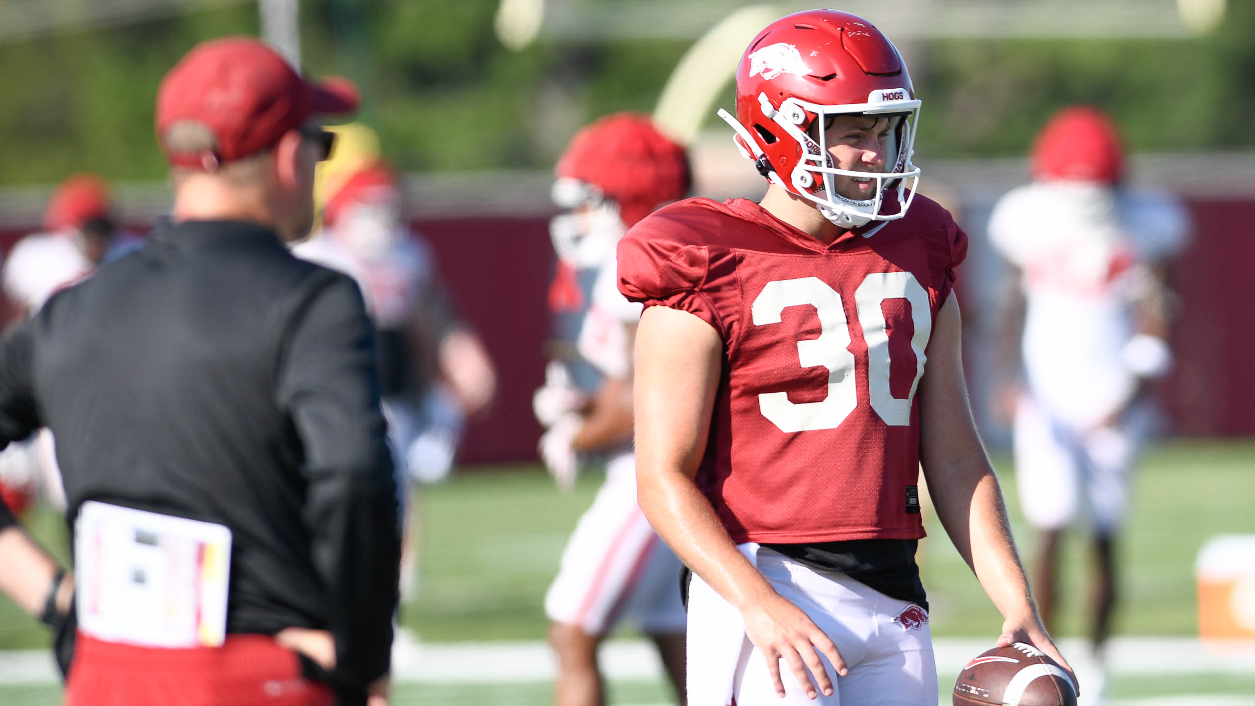Razorbacks punter-holder Reid Bauer, kicker Cam Little after practice ...