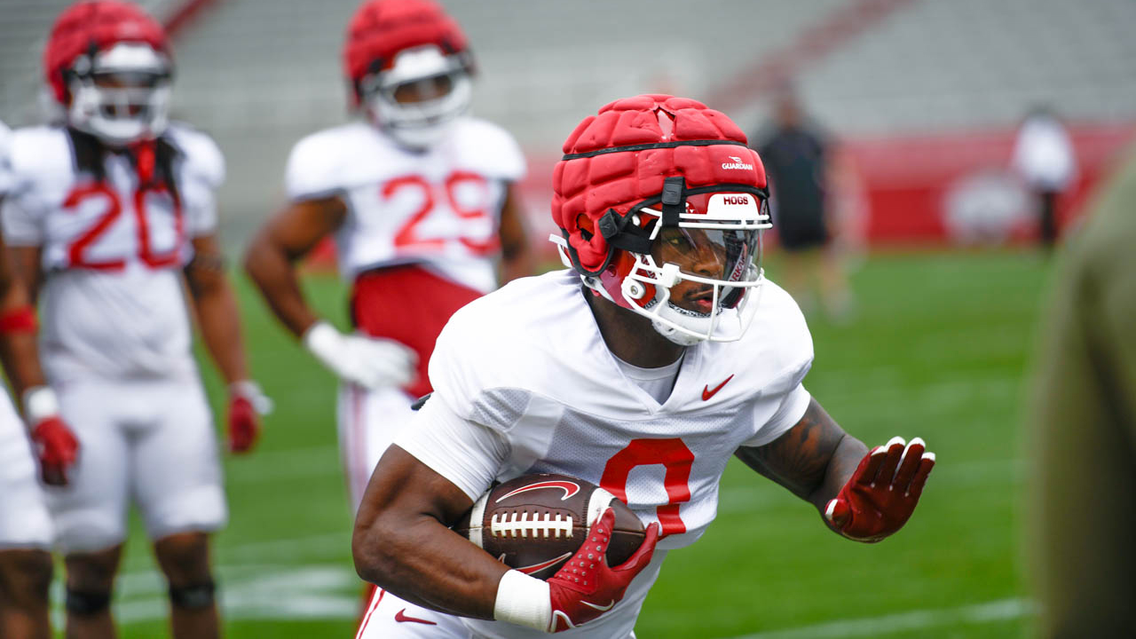 Razorbacks' linebacker Quincy Rhodes, running back Braylen Russell ...
